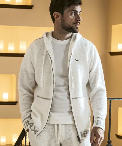 1PIU1UGUALE3 RELAX(ウノピゥウノウグァーレトレ リラックス)裾ロゴ